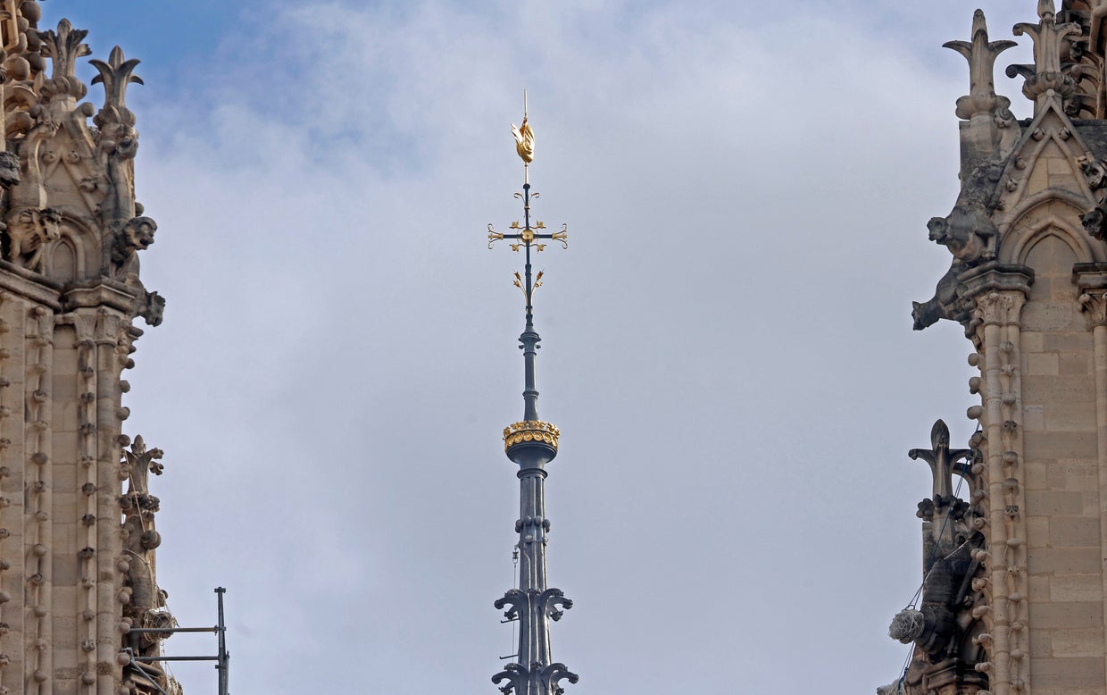 Notre Dame's new spire revealed in Paris, marking a milestone in ...