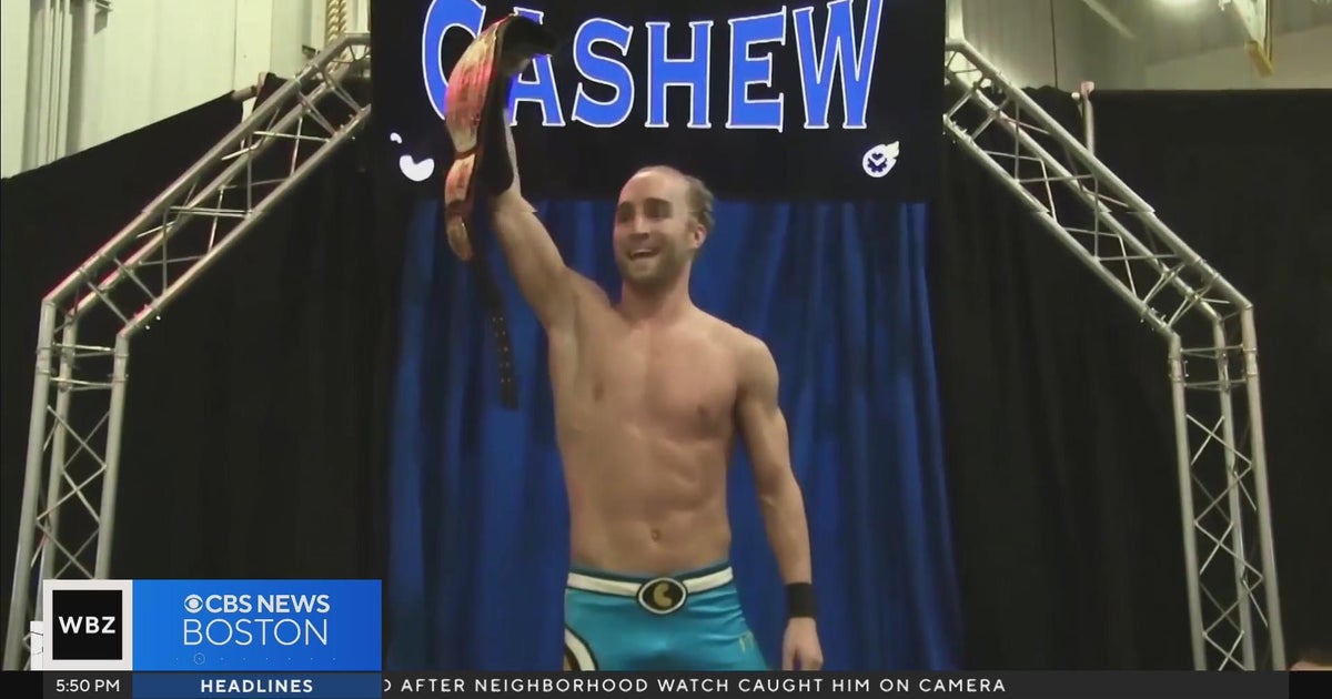 Excel Academy wrestling coach lives out dream as pro wrestler - CBS Boston