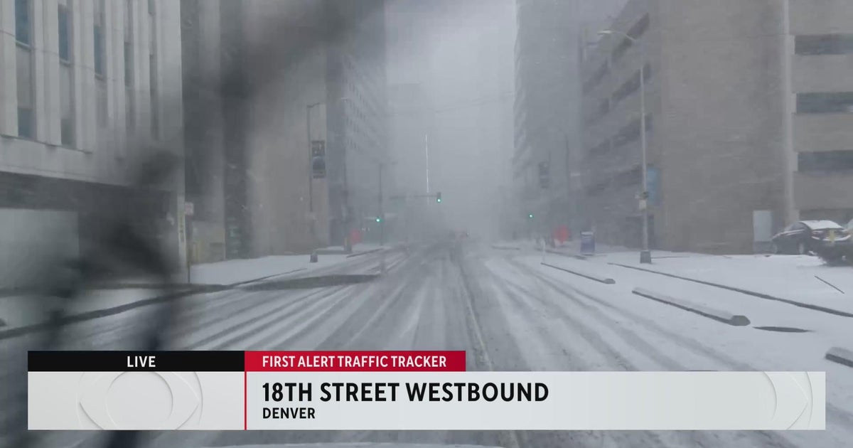 Snow falling in downtown Denver Tuesday morning - CBS Colorado