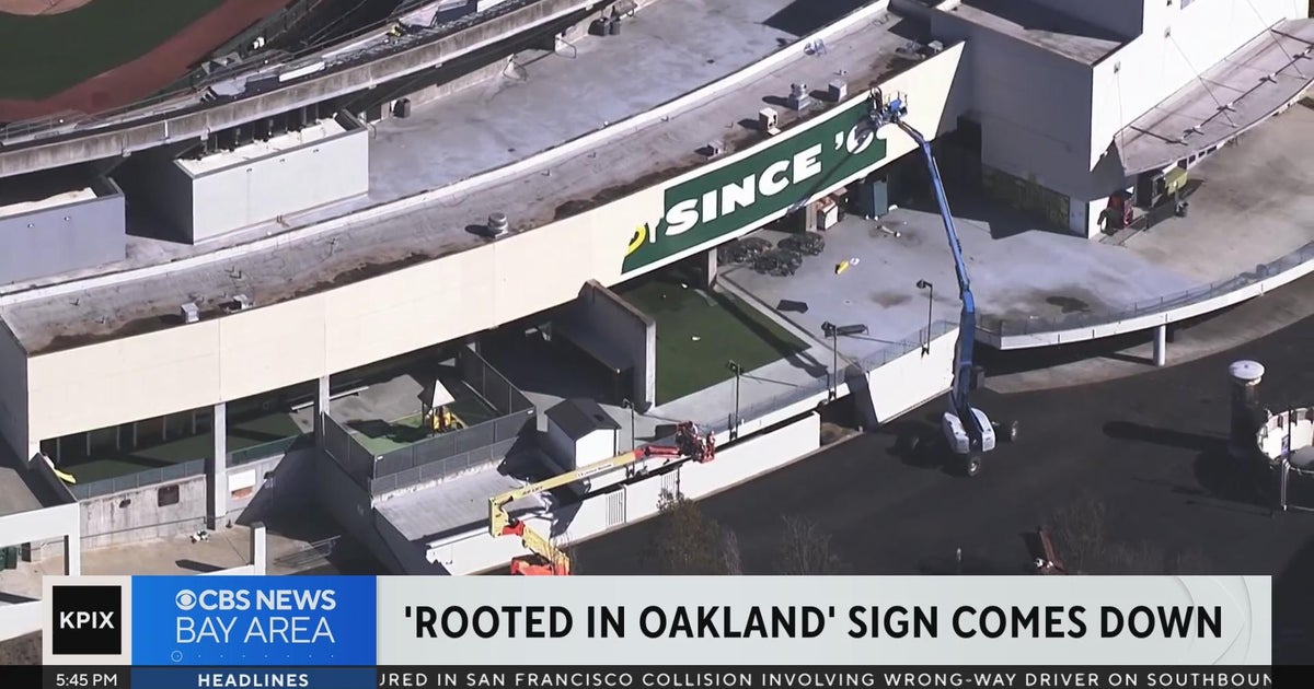 "Rooted in Oakland" sign comes down at Coliseum - CBS San Francisco