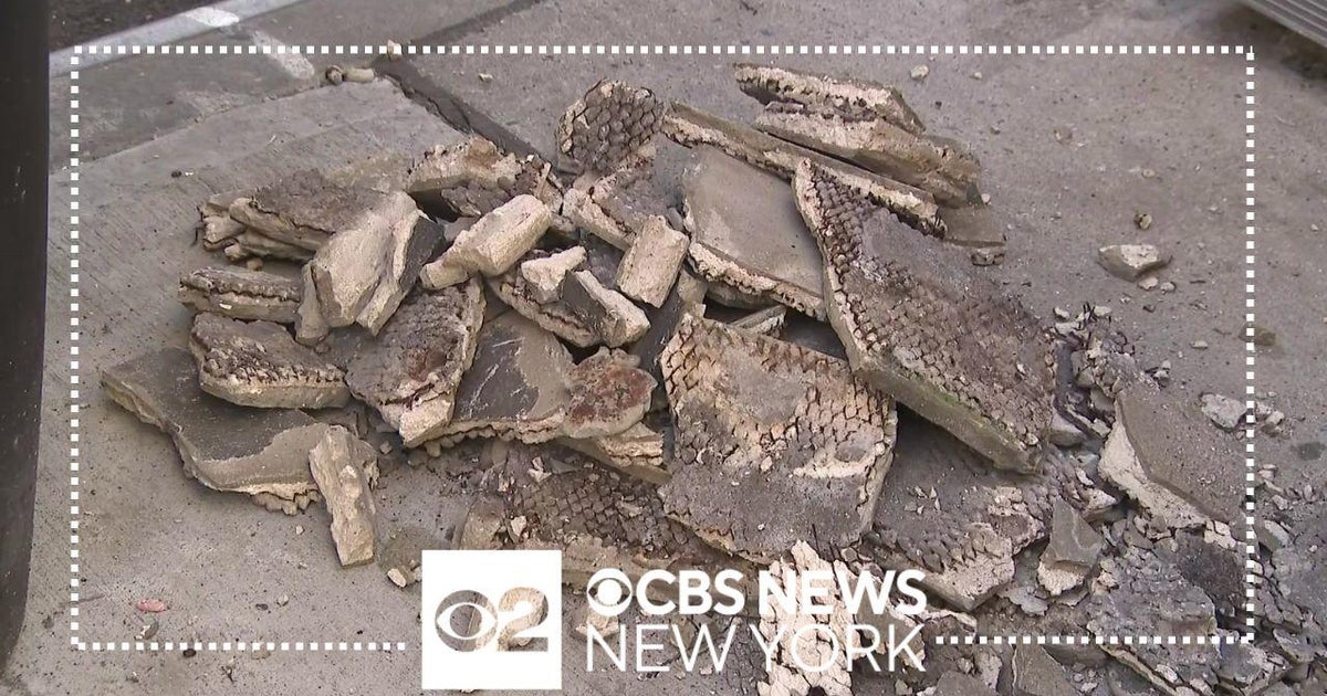 Pieces of concrete fall from building in Washington Heights - CBS New York