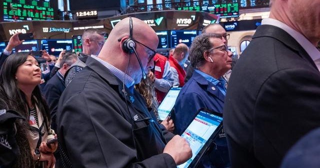 Dow hovering near 40k mark after record-breaking week on Wall Street ...