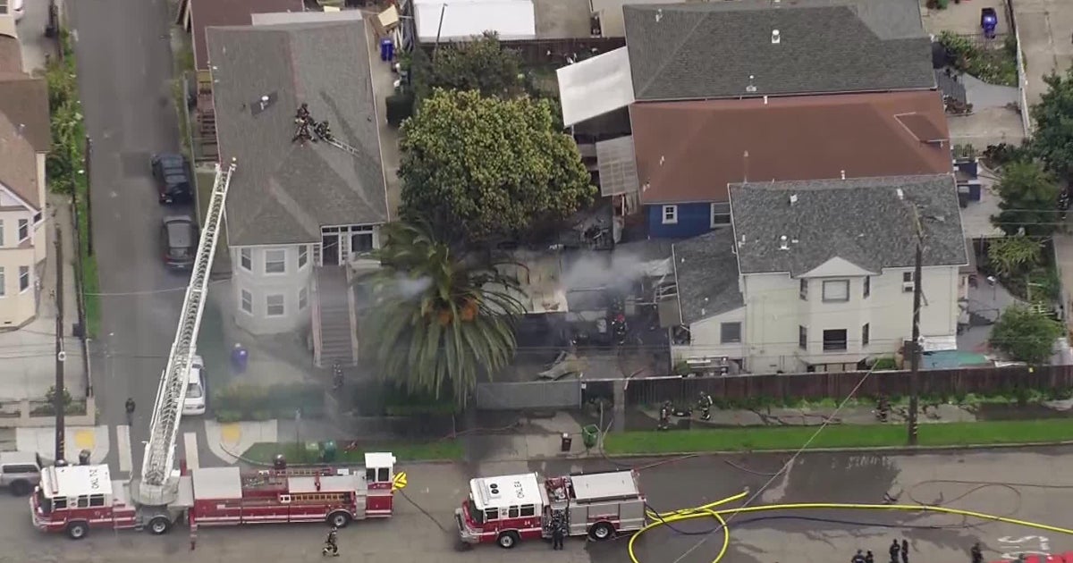 Fire burns home in Oakland's San Antonio district - CBS San Francisco