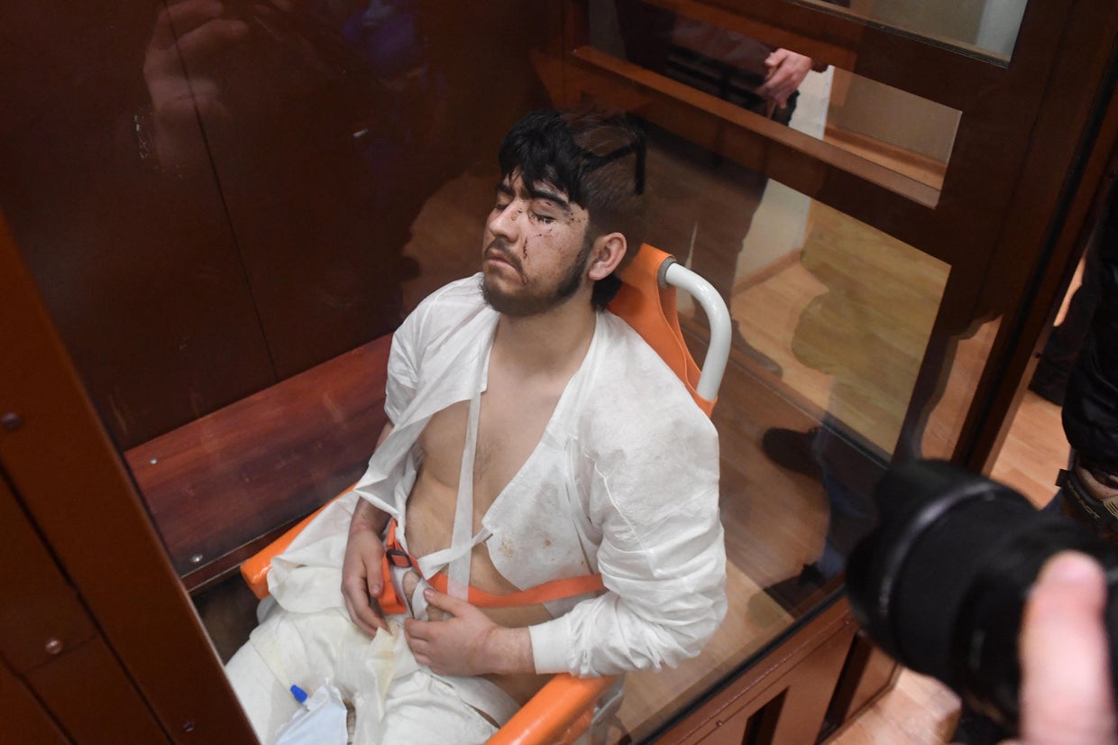 4 accused in Russia concert hall attack appear in court, apparently ...