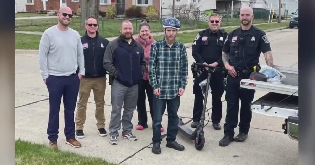 Roseville police surprise resident with new scooter - CBS Detroit