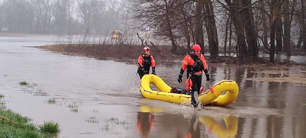 Special needs students rescued from school bus stuck in flood in ...