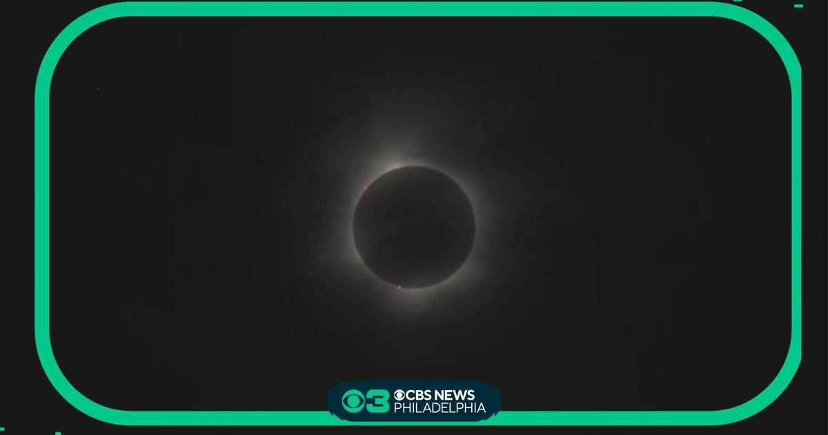 Solar eclipse's moment of totality plunges Erie, Pennsylvania into ...