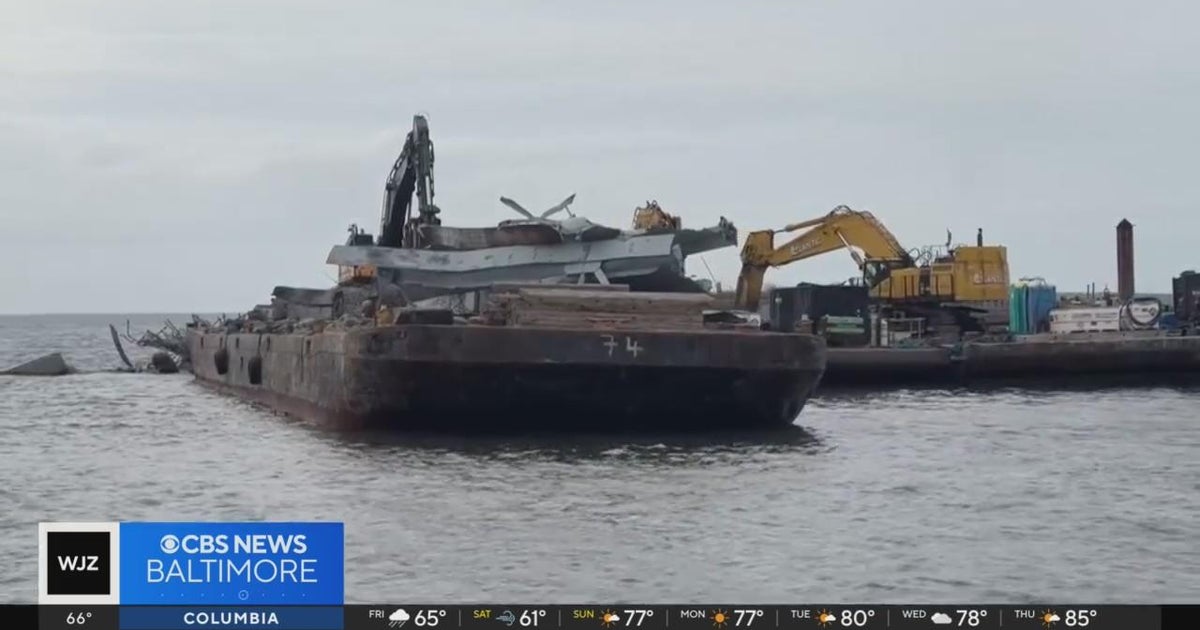 New video shows efforts lifting containers off cargo ship at Key Bridge ...