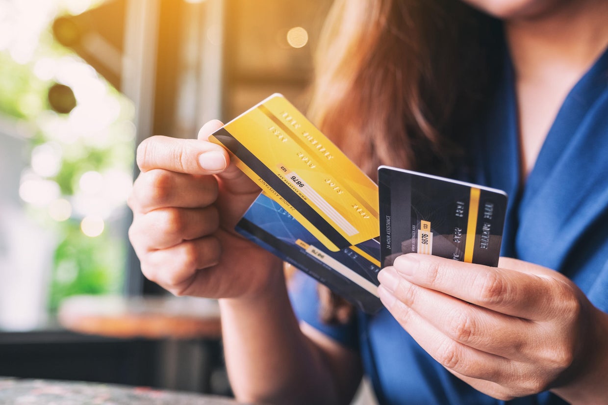Debt consolidation vs. debt settlement: Which is better? - CBS News