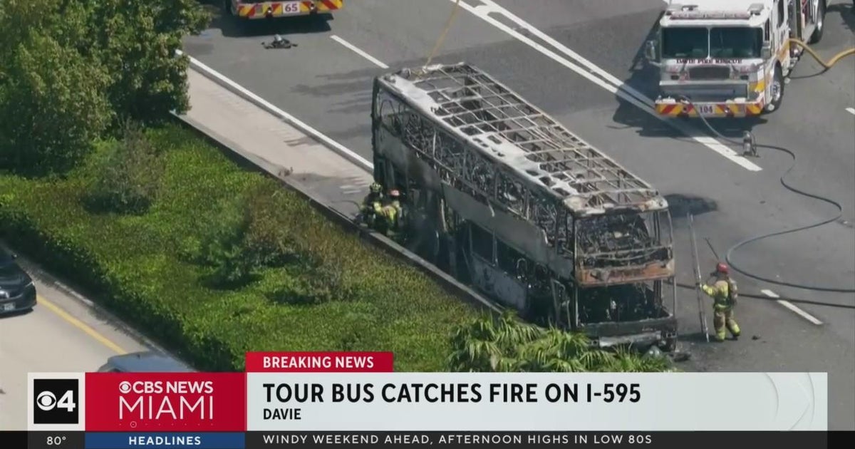 Tour bus catches fire on I-595 - CBS Miami
