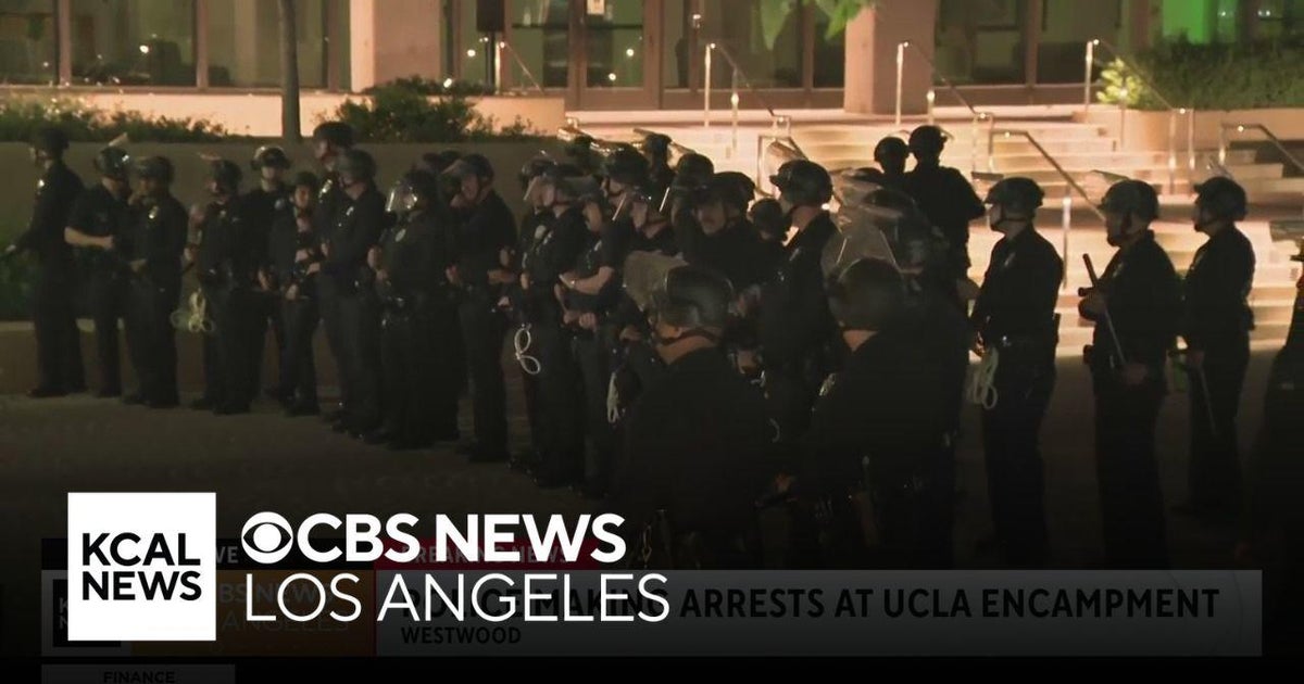 Officers in riot gear lead protesters away in handcuffs - CBS Los Angeles