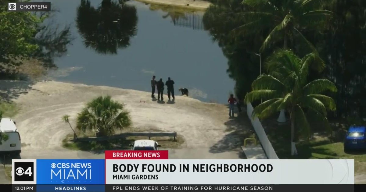Man's body found near canal in Miami Gardens neighborhood - CBS Miami