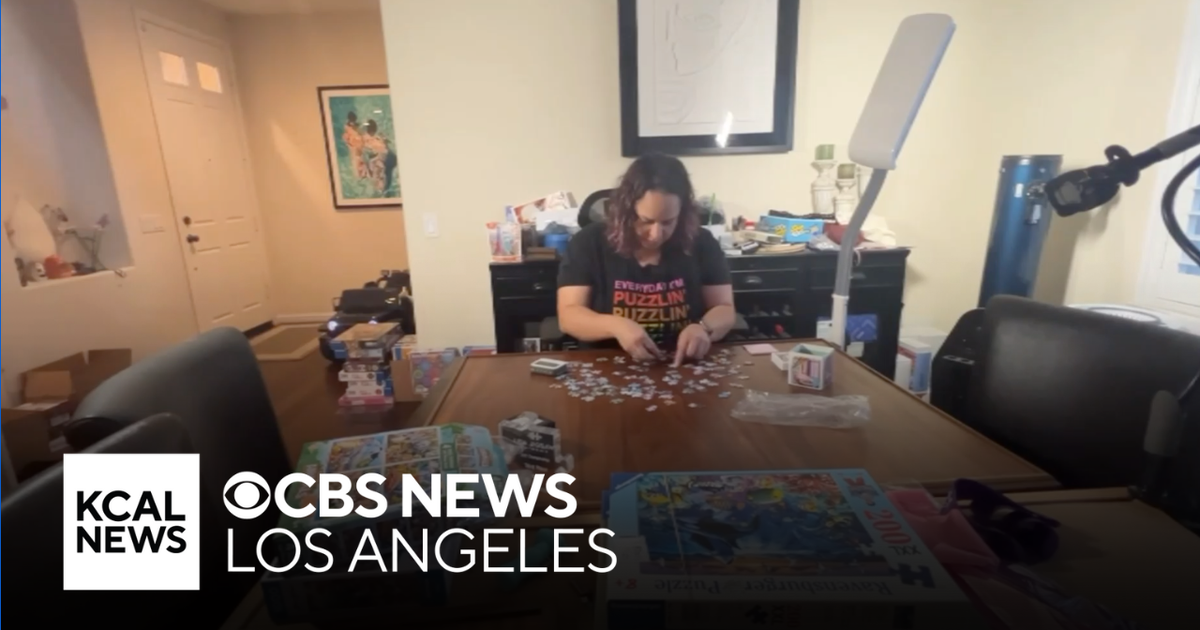 Local doctor eyes world championship in speed puzzling - CBS Los Angeles