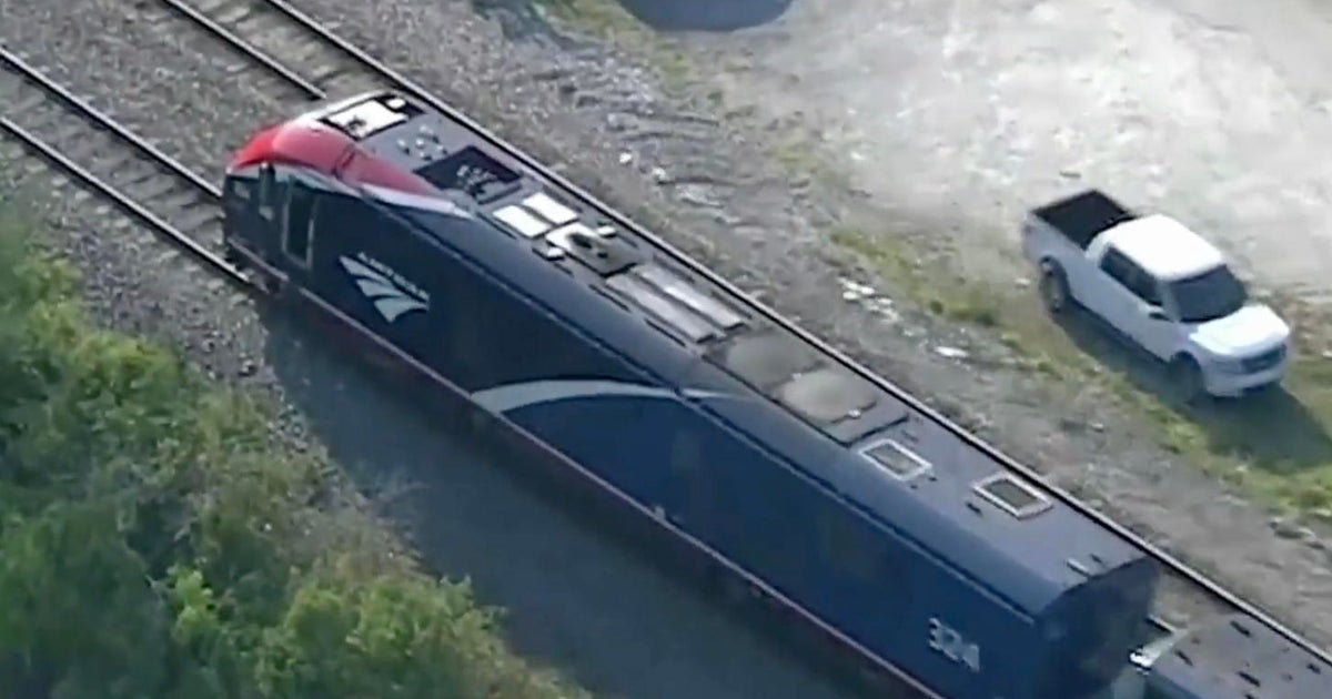 Aerials show moment after an Amtrak train hit a vehicle in Opa-locka ...