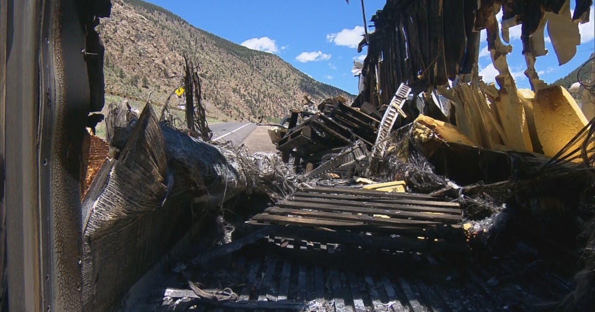 Burned-out trailer left on side of Colorado's I-70 sparks questions in ...