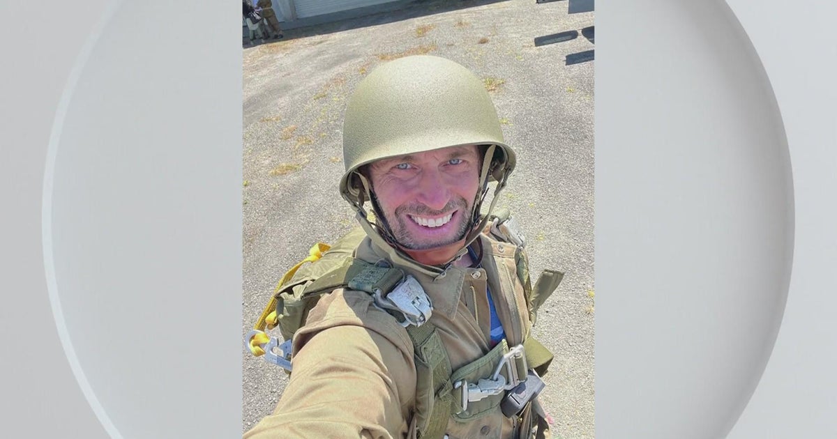 Colorado Congressman Jason Crow leads jump over Normandy from C-47 that ...