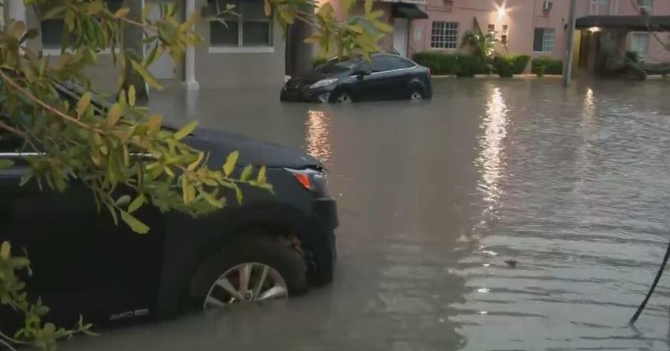 Miami street flooding after 24 hours of rain, more of the wet stuff is ...
