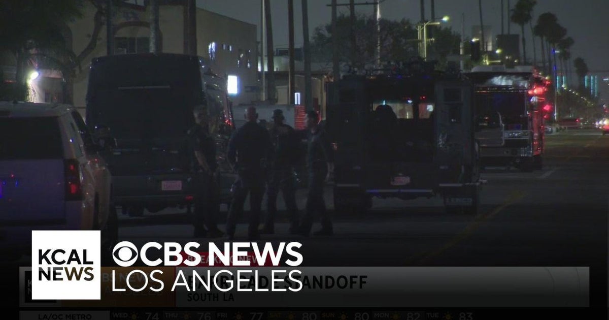 SWAT standoff with man barricaded inside South LA business - CBS Los ...