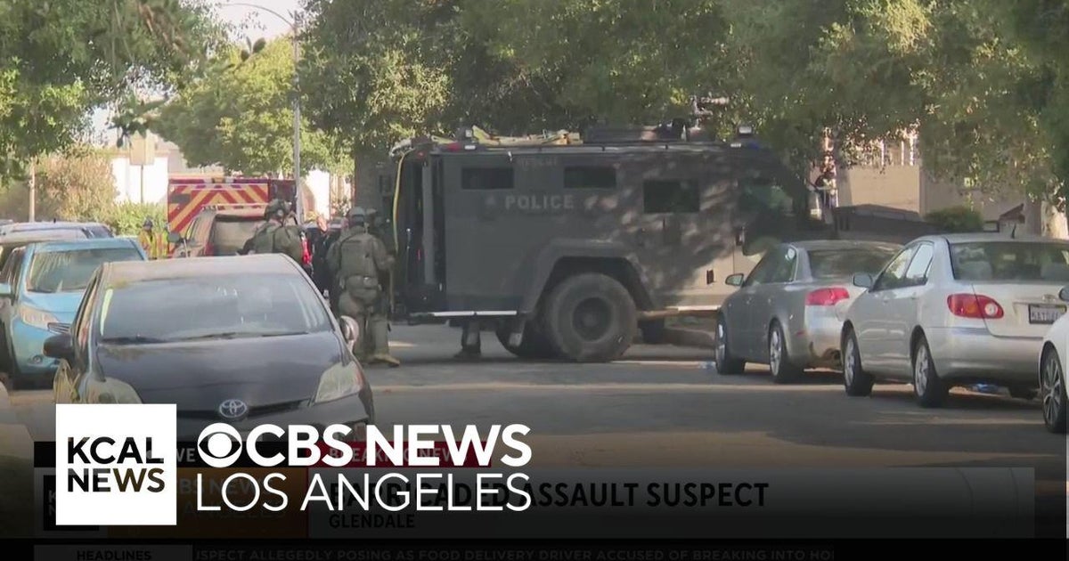Glendale police surround an apartment building where an assault suspect ...