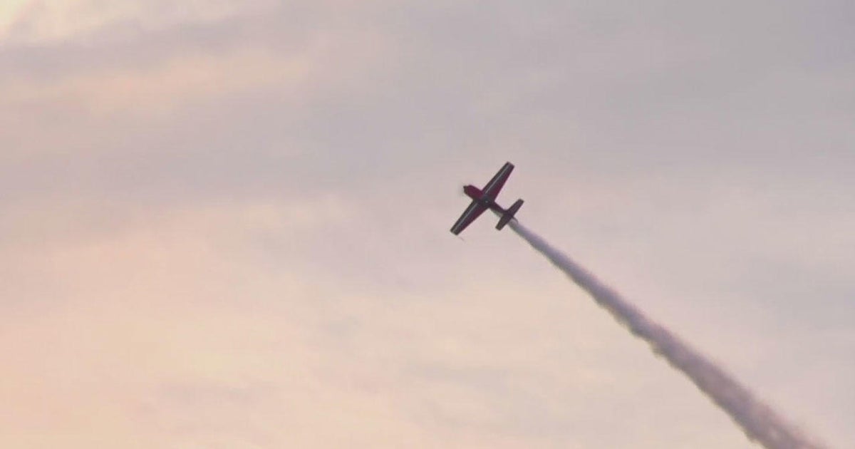 Stunt pilot performs for 10th year at Addison's Kaboom Town - CBS Texas