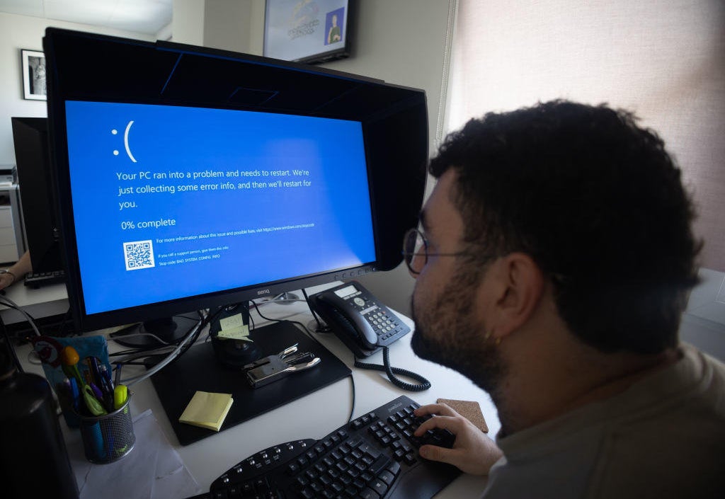 Microsoft outage brings "blue screen of death" to computer systems ...
