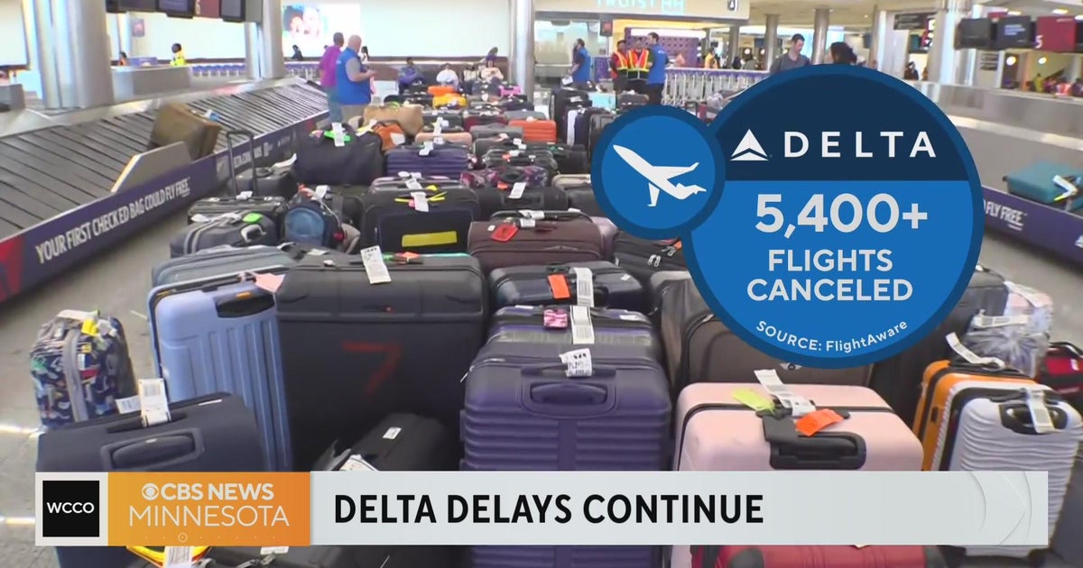 Sea of baggage from canceled Delta flights floods Atlanta airport - CBS ...