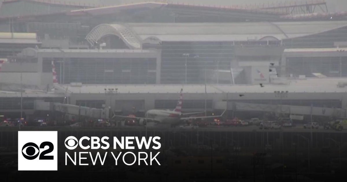 10 hurt in JFK Airport fire that shut down Terminal 8 - CBS New York
