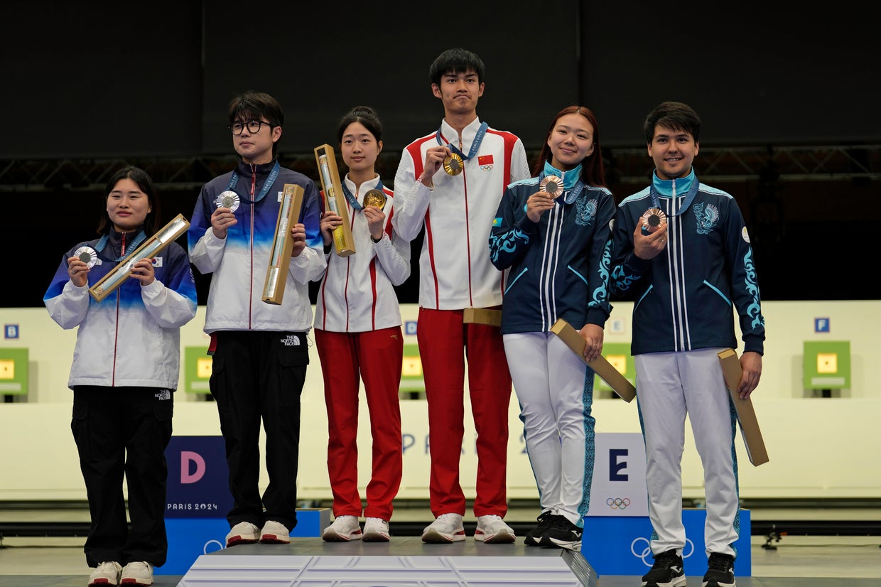 China earns first gold medal of the 2024 Paris Olympics in mixed team air rifle shooting - CBS News