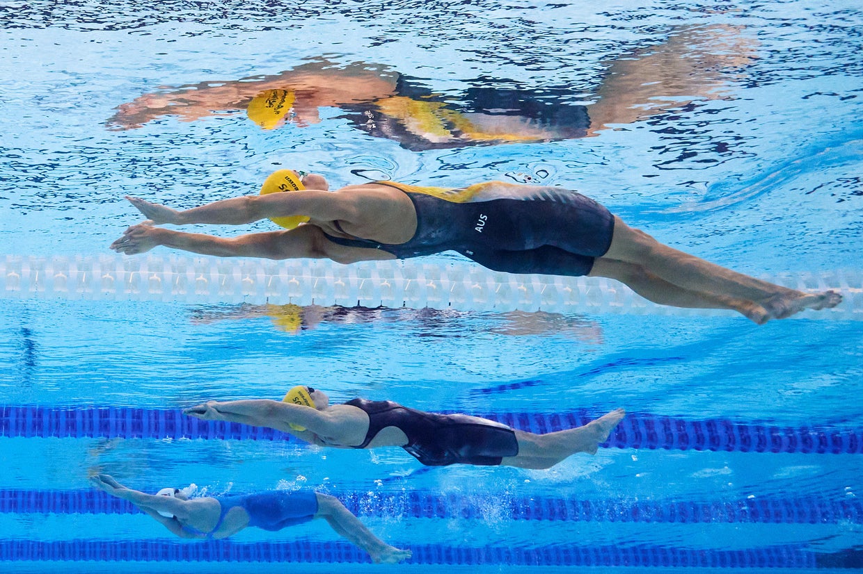 Why some types of swimsuits are banned at the Olympics - CBS News