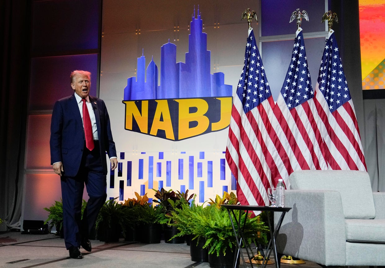 Trump falsely attacks Kamala Harris over race, saying she "happened to ...