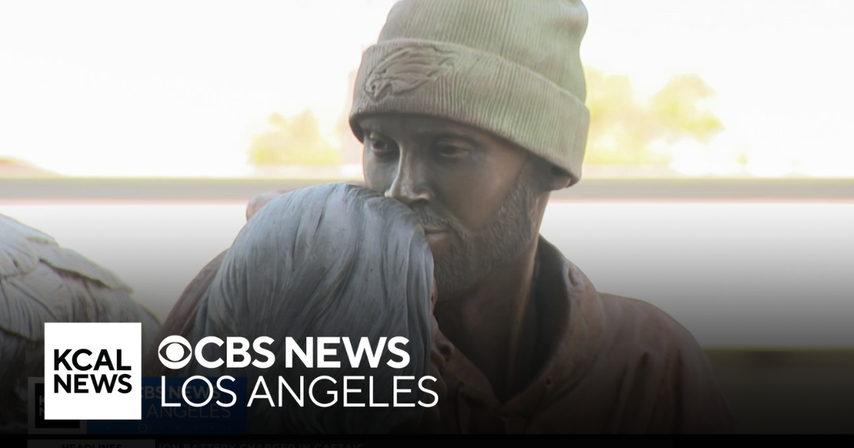 Fans flock for first glimpse of statue depicting Kobe Bryant and his ...