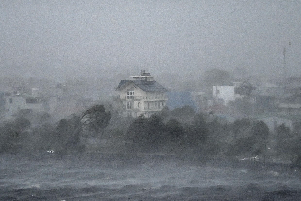 Typhoon Yagi hits Vietnam with torrential rains, killing almost 60 as ...