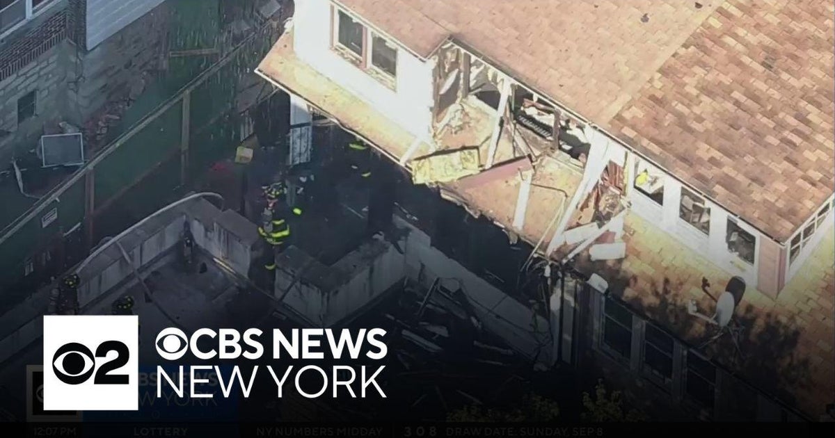 2 firefighters hospitalized after Bronx building fire - CBS New York