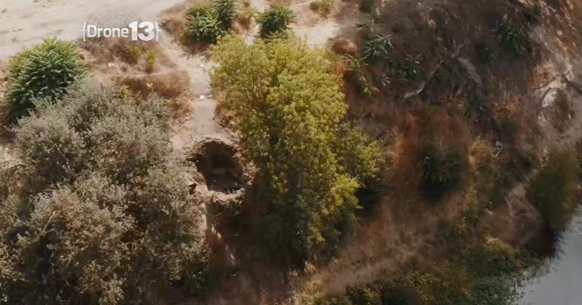 Modesto homeless move back into formerly furnished Tuolumne River caves ...
