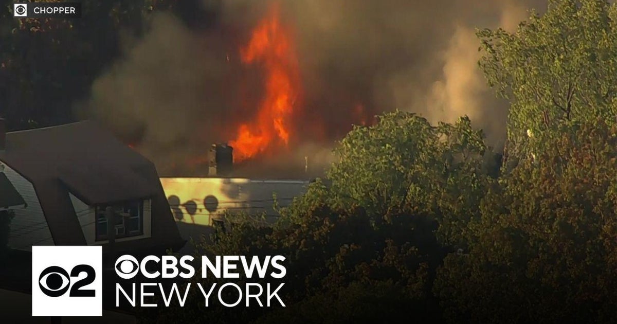 Firefighters battling massive flames at building in Newark, N.J. - CBS ...