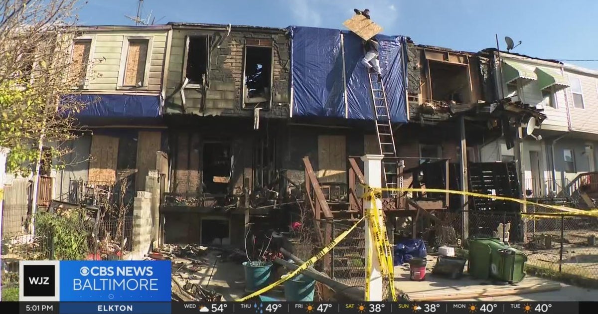 Greektown community cleaning up after deadly rowhome fire - CBS Baltimore