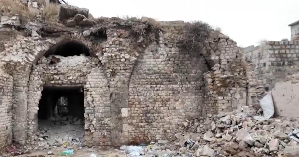 A look at ruins of Aleppo after Assad's fall - CBS News