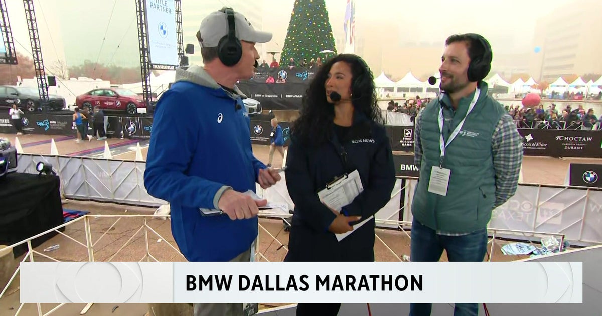 The first runners cross the finish line at the 2024 BMW Dallas Marathon ...