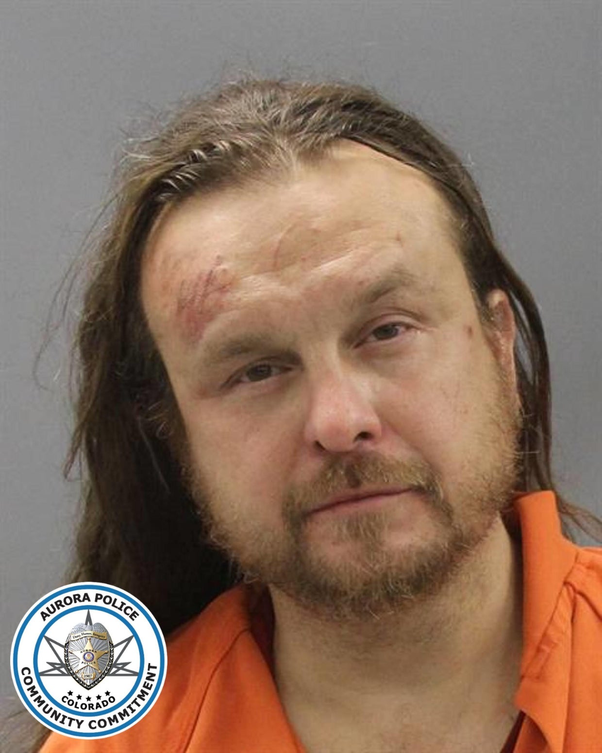 Aurora man charged with arson in setting fire at his own apartment that ...