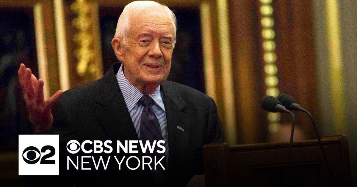 Jimmy Carter's motorcade traveling through Plains, Georgia - CBS New York