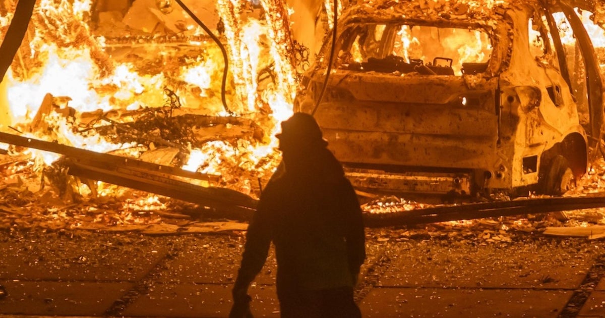 Palisades restaurant owner "in shock" after pizzeria burned down - CBS News