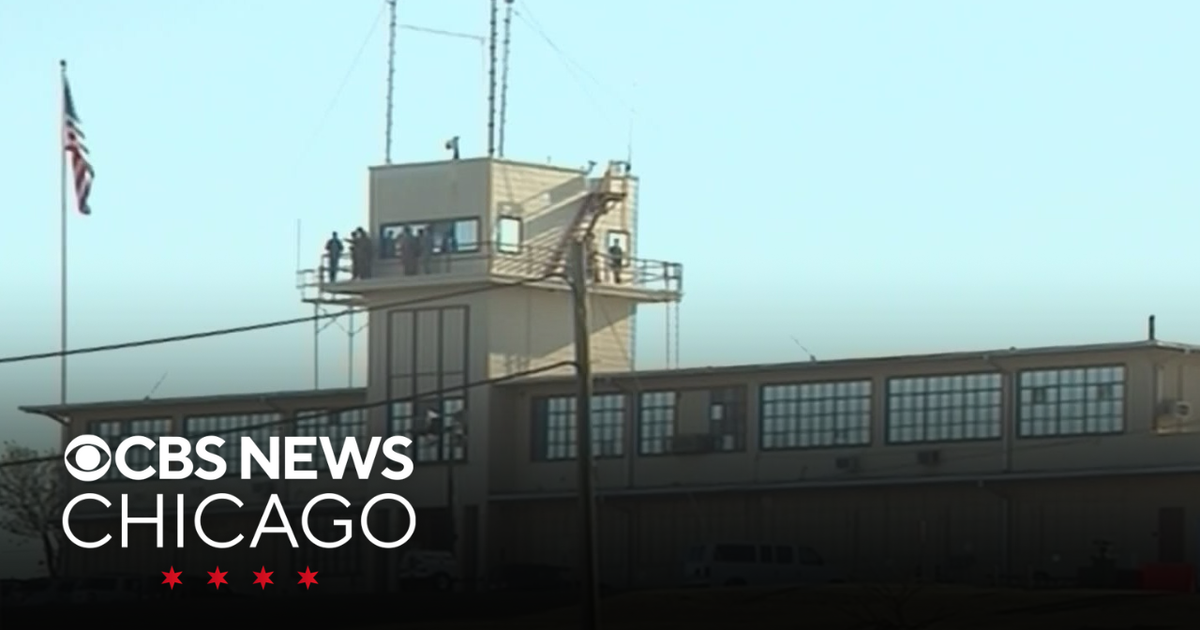 President Trump signs order to send migrants to Guantánamo Bay - CBS ...