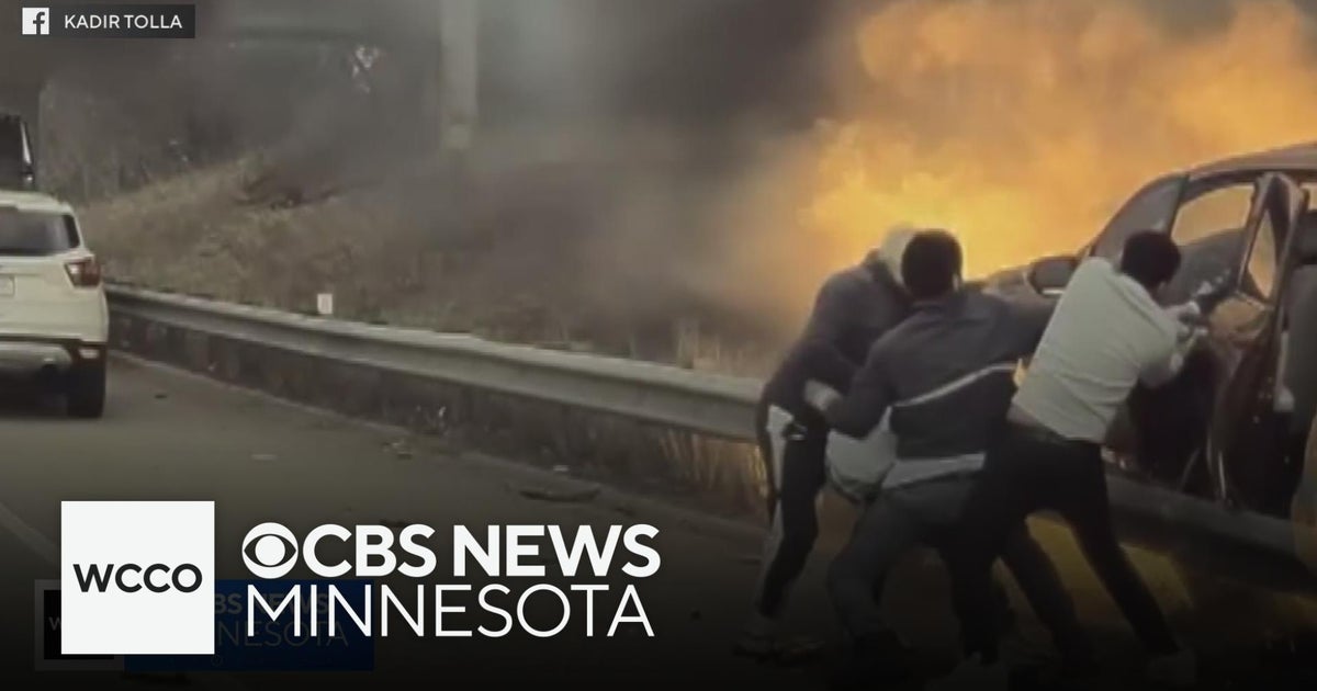 Man thanks heroic men who pulled him from a burning car - CBS Minnesota