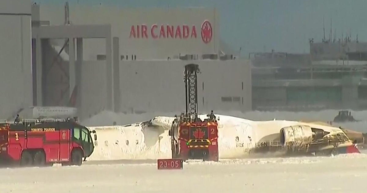 Delta plane crashes and flips upside down while landing in Toronto ...