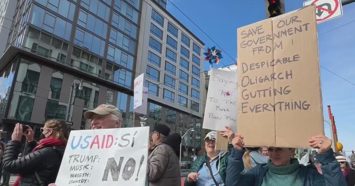 Protesters march against Trump administration, DOGE cuts on Presidents ...