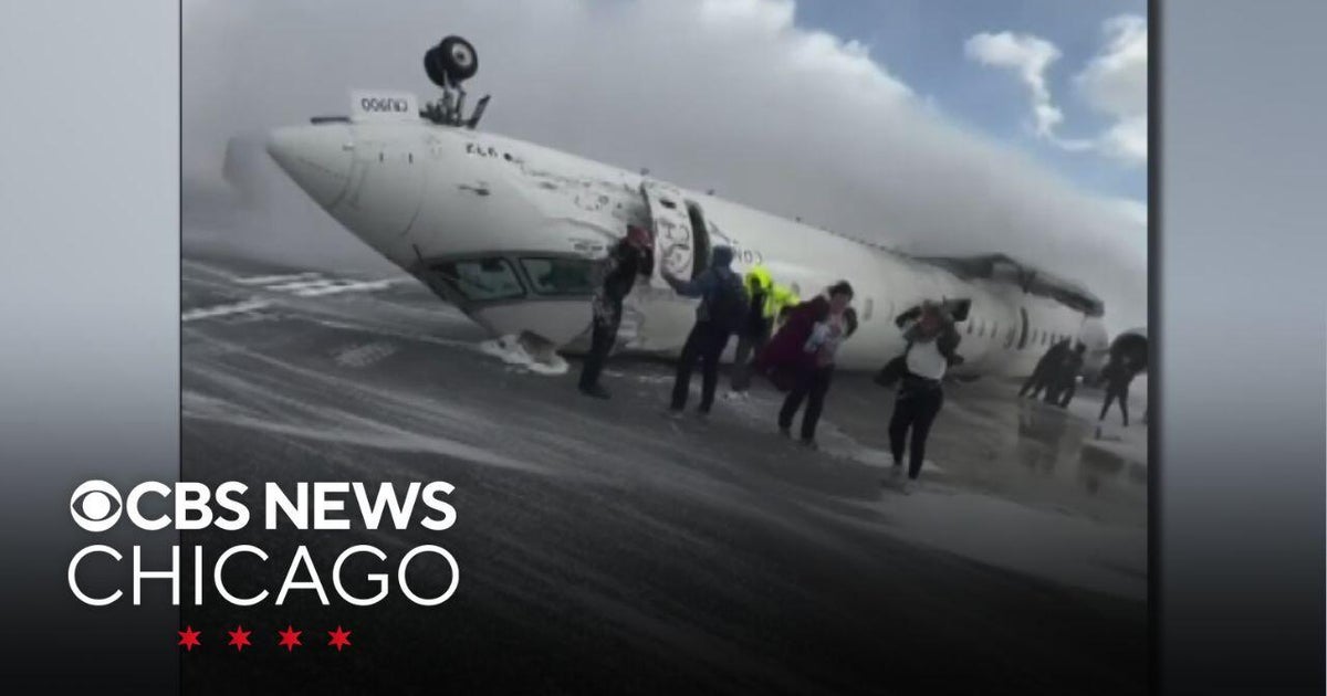 Wild video shows passengers escaping after plane crash lands in Toronto ...