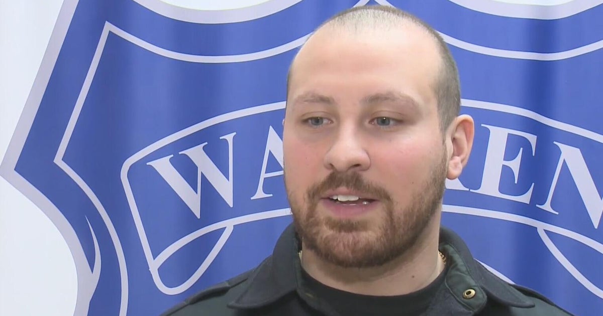 Michigan police officer hailed as hero for saving drowning child - CBS ...