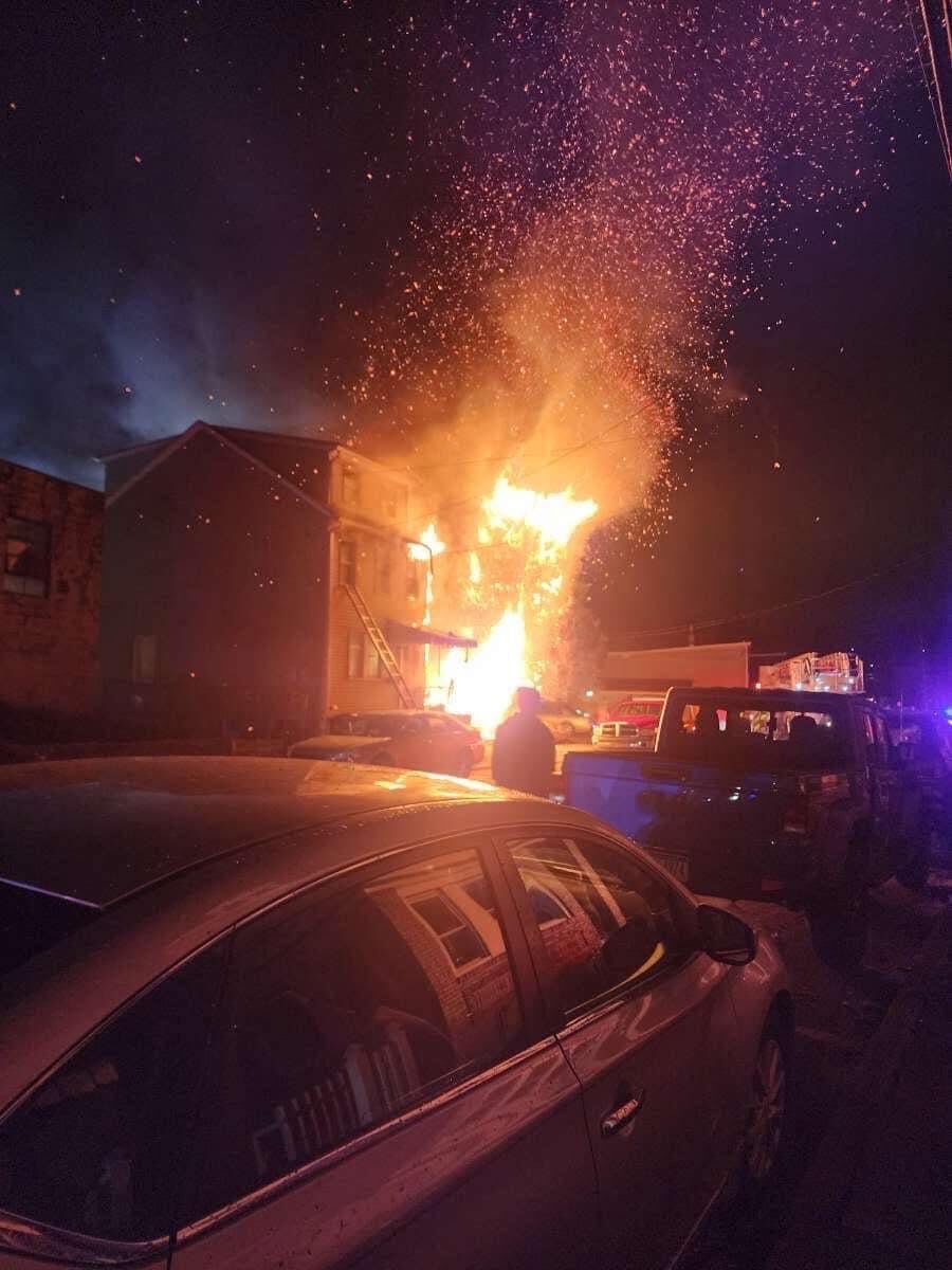 Fire crews battle a house fire in Millvale - CBS Pittsburgh