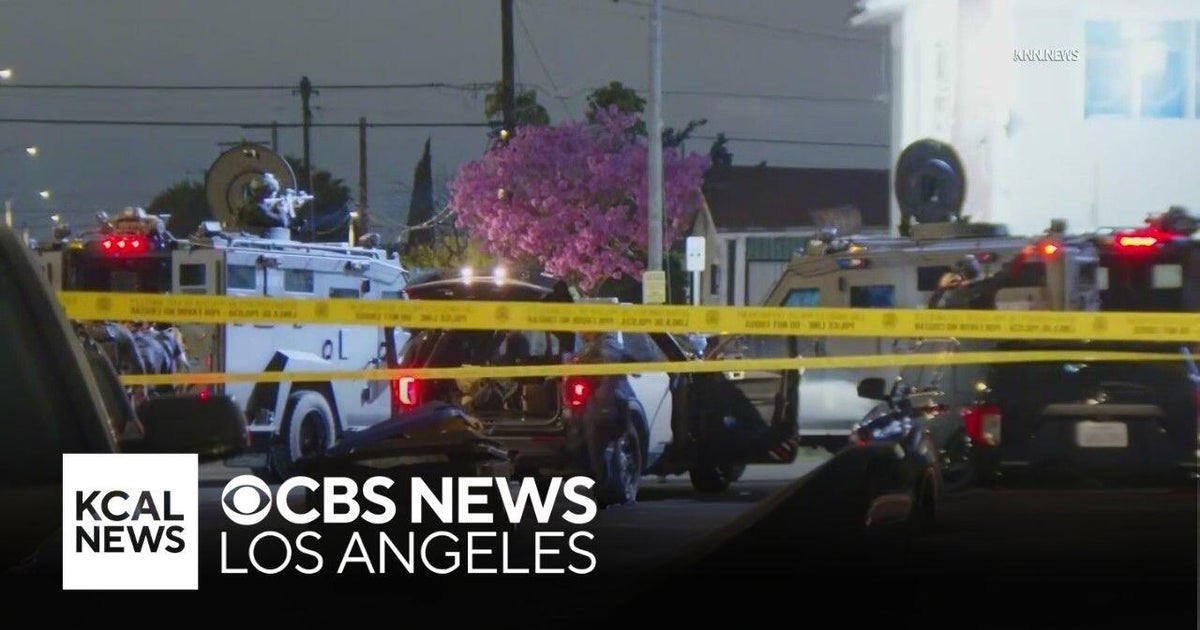 Man armed with rifle shot by LAPD officers during standoff in South LA ...