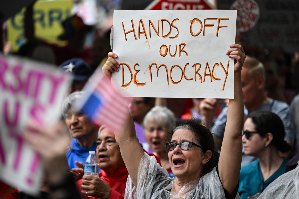 "Hands Off!": Americans across country protest Trump, Musk